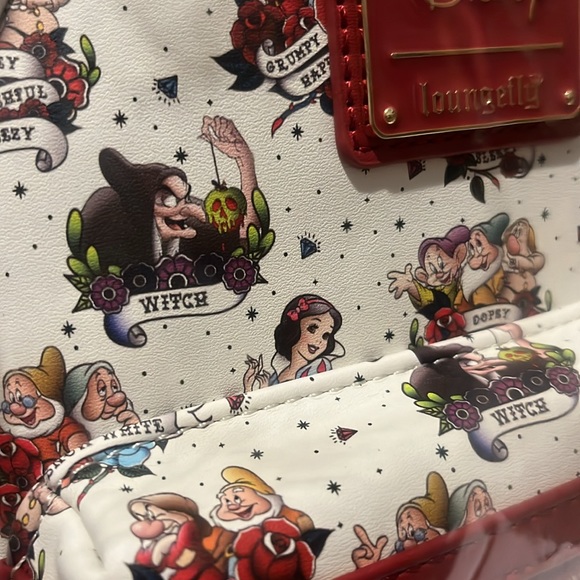 Loungefly | Bags | Loungefly Disney Snow White Tattoo Aop Mini Backpack ...